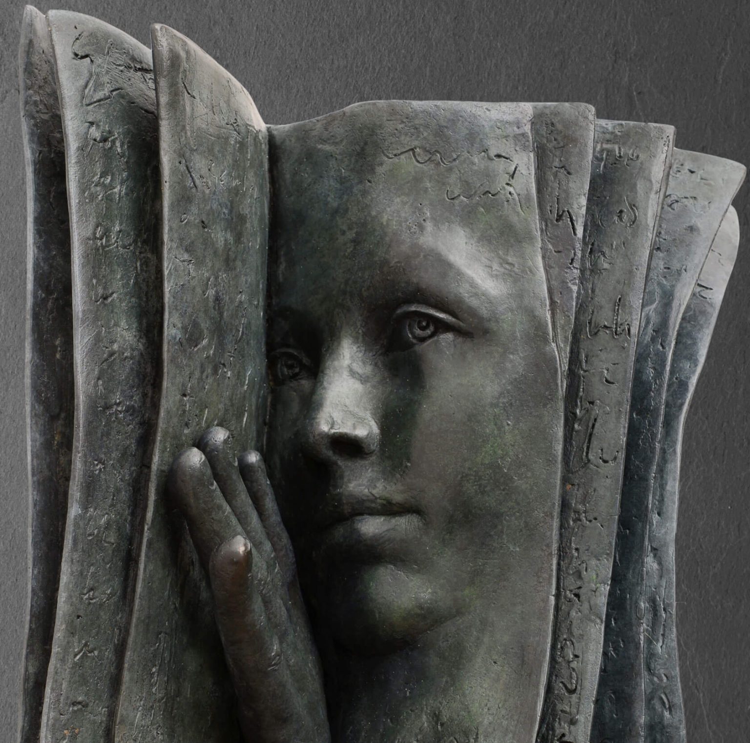 Mysterious Faces Emerge From Books in Paola Grizi's Striking Sculptures ...