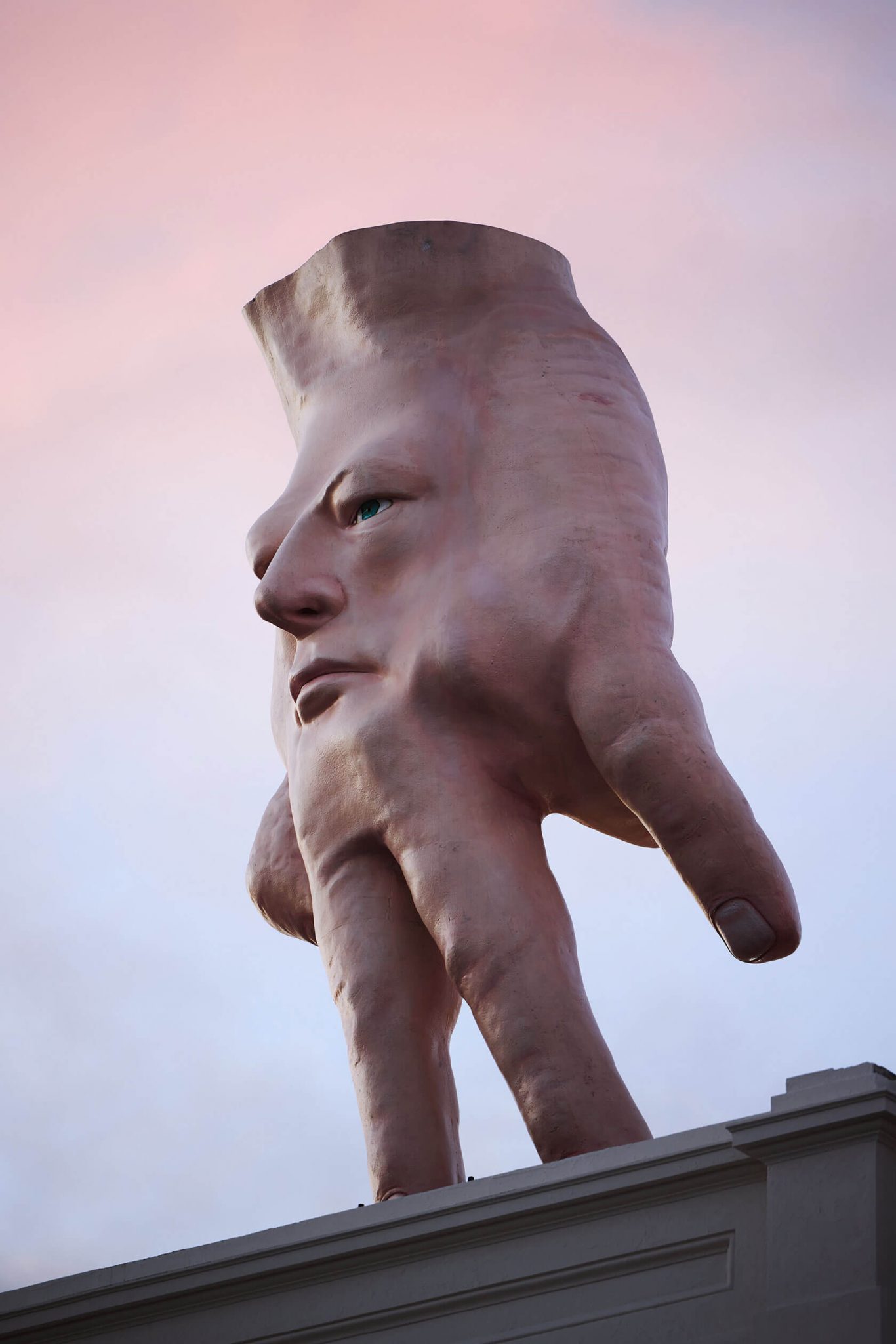Quasi: Ronnie van Hout’s Surreal Hand-Faced Giant Watches Over the City ...